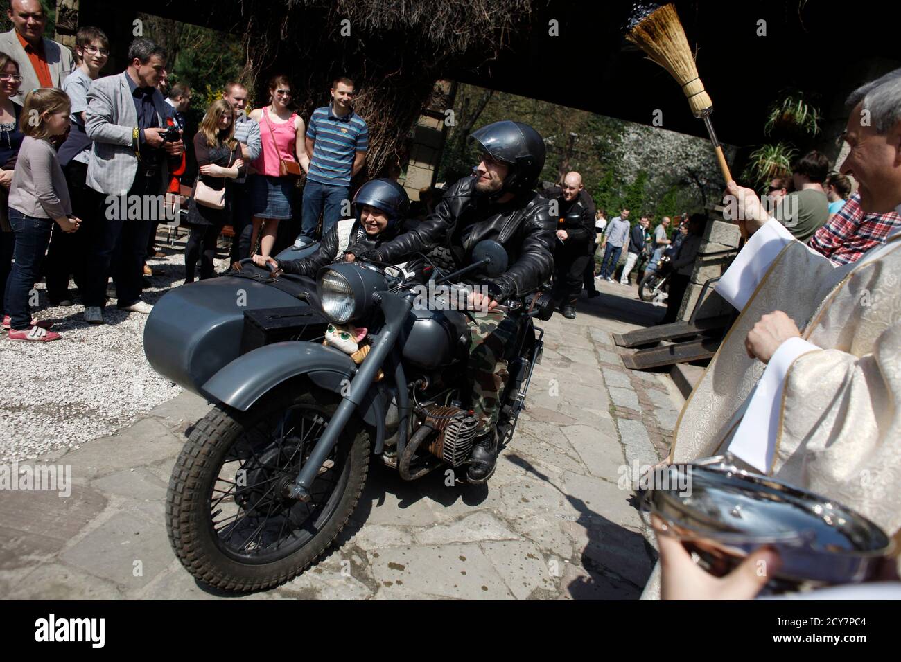 Catholic priest sprinkles holy water hi-res stock photography and ...