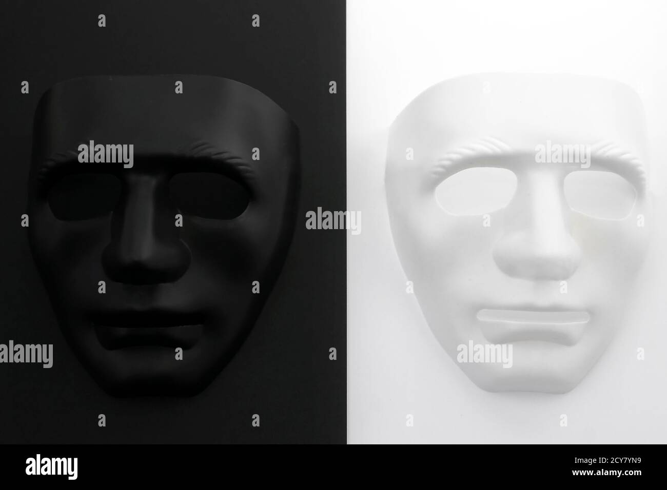 Two masks contrasting with each other Two masks contrasting with each ...
