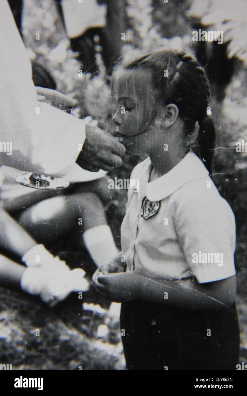 Fine 1970s vintage black and white photography of a young girl standing ...