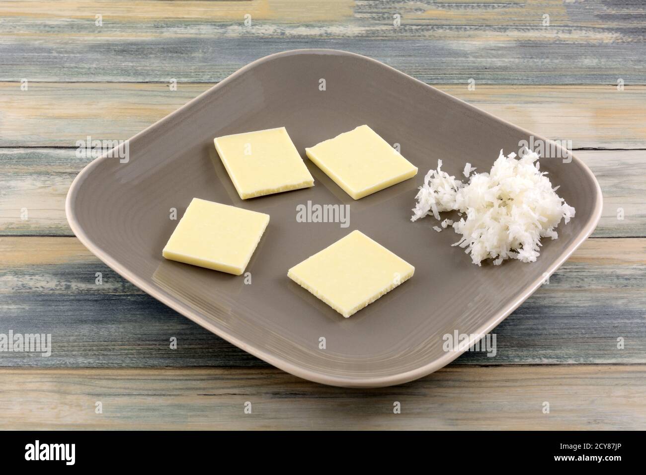 White chocolate candy bar with coconut bits and shredded sweet coconut ...