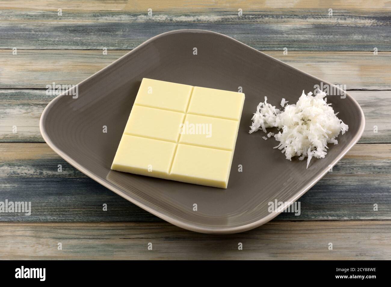 White chocolate candy bar with coconut buts and shredded sweet coconut ...