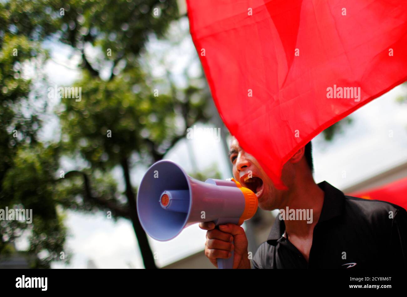 Protester using megaphone hi-res stock photography and images - Alamy