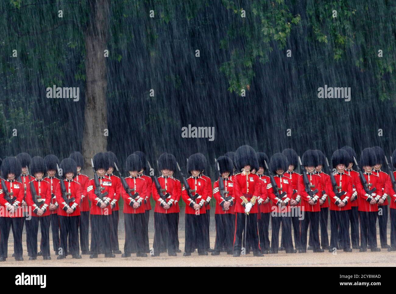 Guardsmen of the Scots Guards parade in the rain during the Colonel's ...