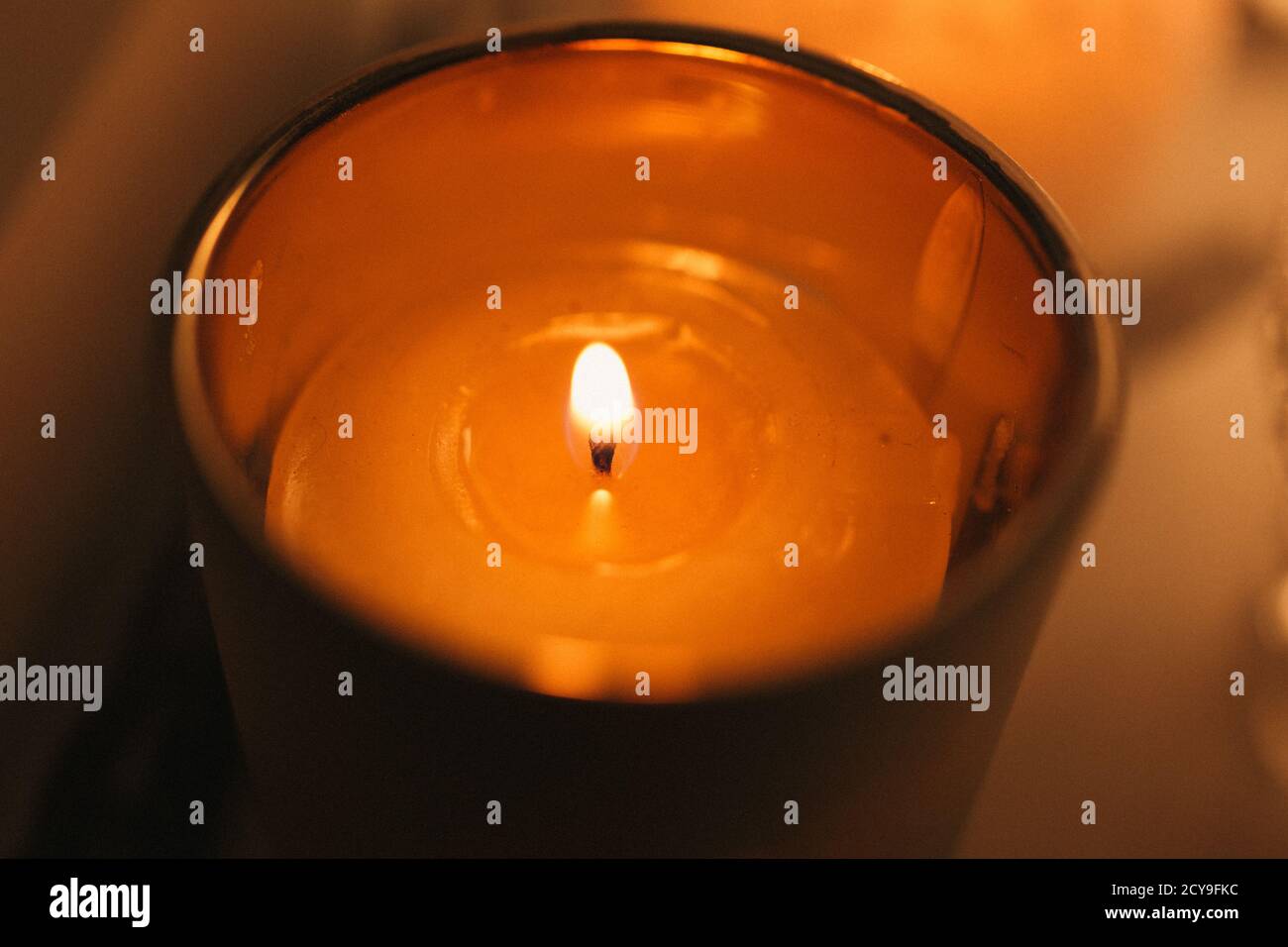 Closeup shot of a small flame on a burning candle Stock Photo - Alamy