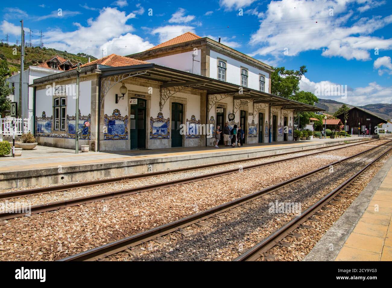 Pinhao, Portugal - June 27, 2017 - Train tracks lead into station with ...