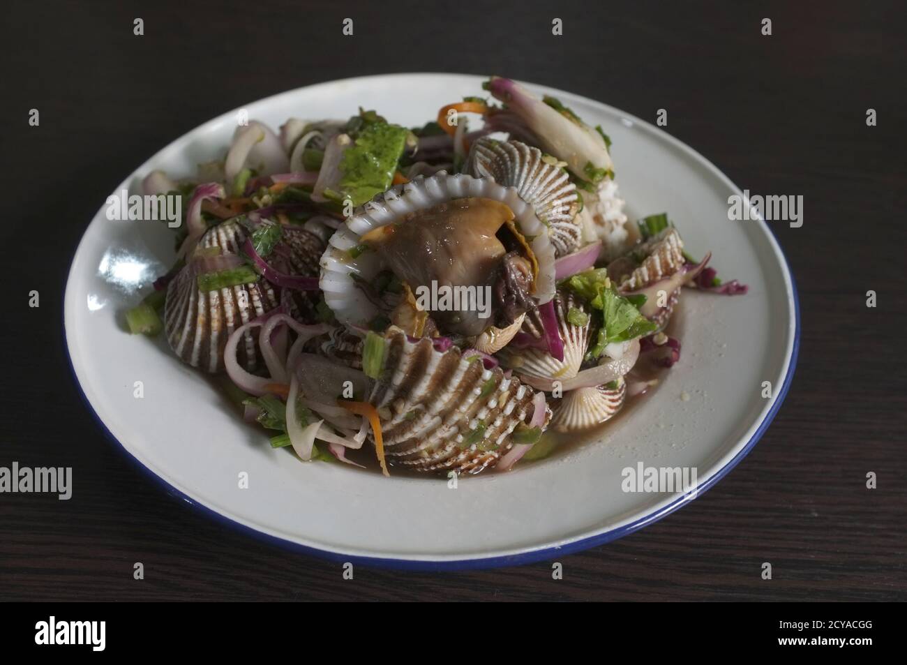 Thai street food , Spicy blood cockle salad Stock Photo - Alamy