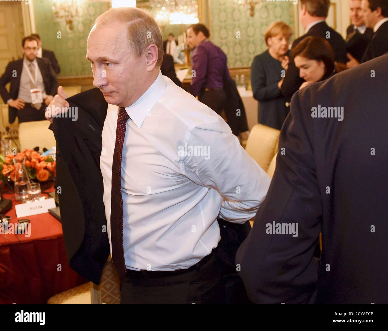 Vladimir putin in suite hi-res stock photography and images - Alamy