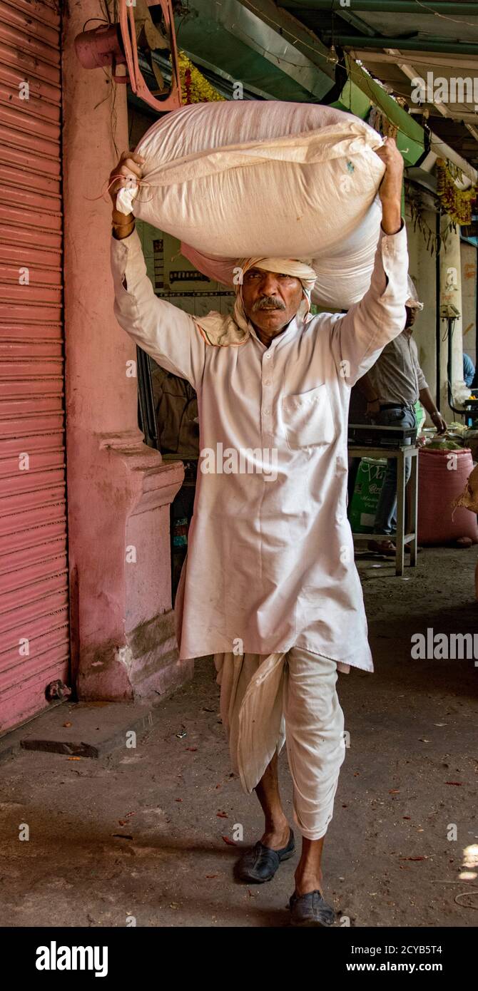 Big load man hi-res stock photography and images - Alamy