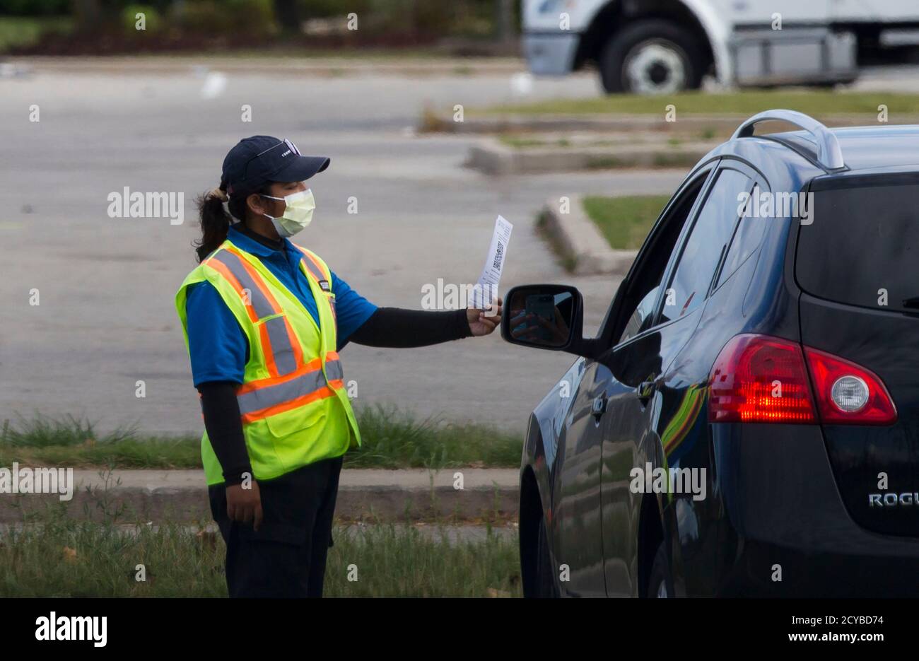 Brampton, Canada. 1st Oct, 2020. A security officer wearing a face mask ...