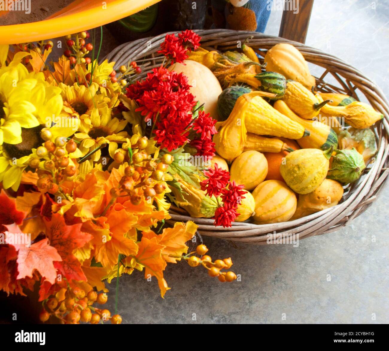 Large Basket Full of Gourds and Fall Decor Stock Photo - Alamy