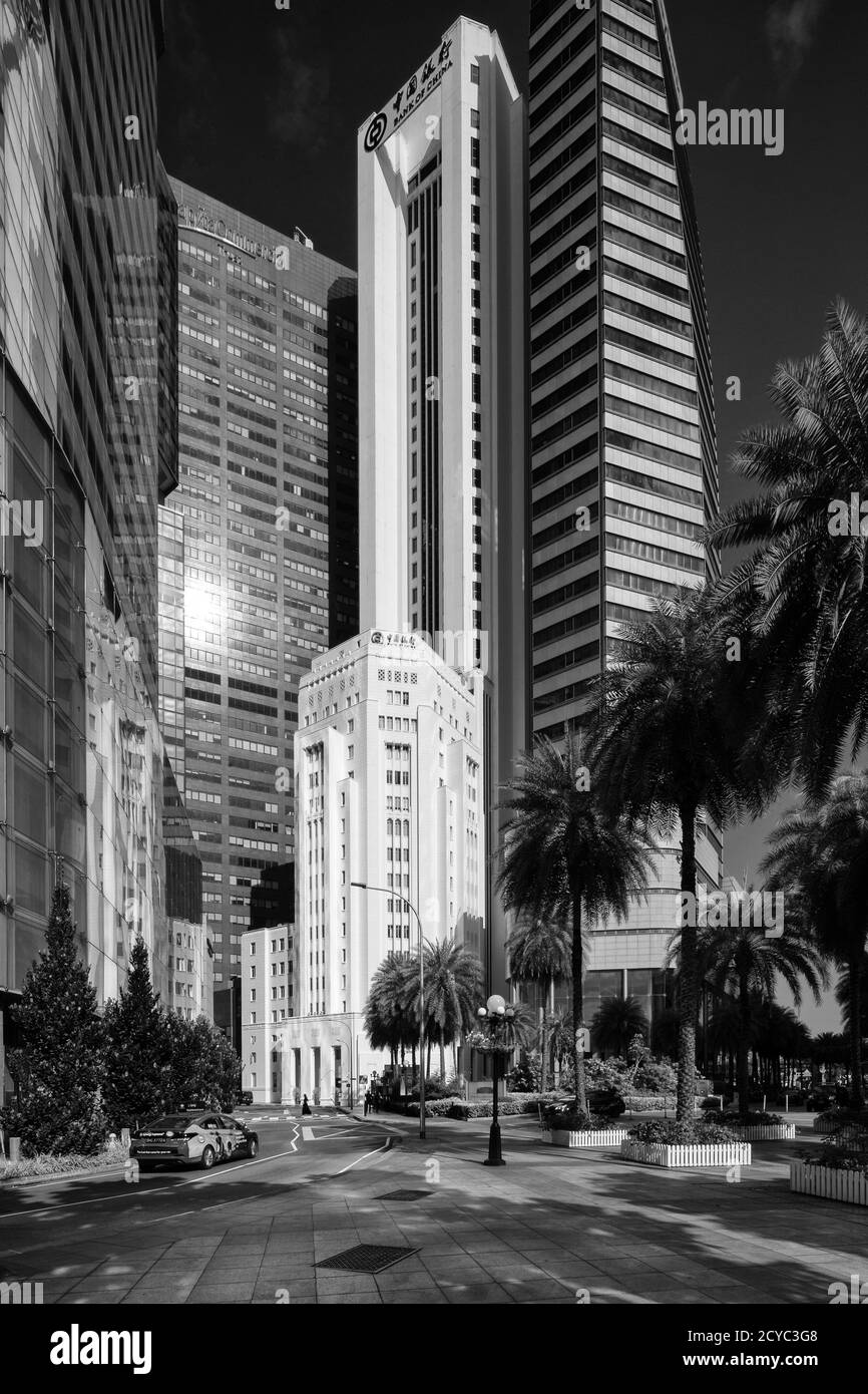 Vertical scene of commercial buildings that are very close to one ...