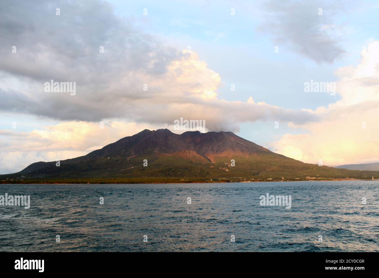 Sakurajima getting dark around Kamoikekaizuri Park during sunset. Taken ...