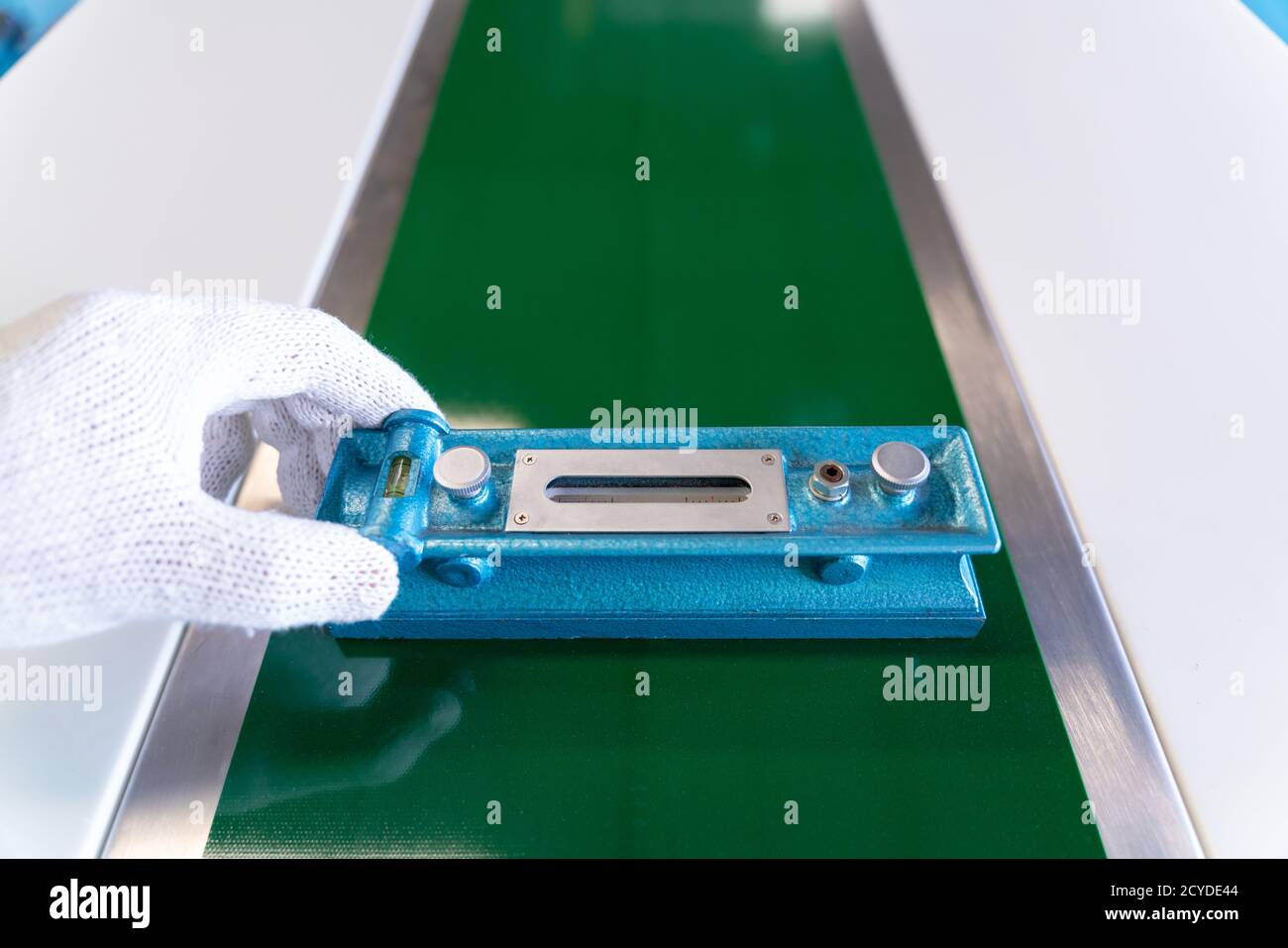 Close up of hand Mechanic technician worker use a water level meter ...