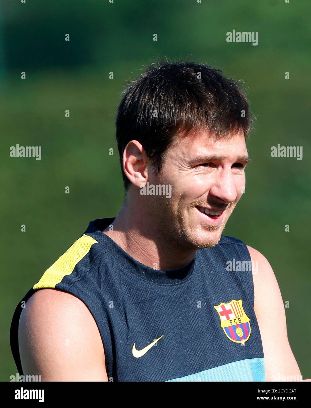 Barcelonas lionel messi attends training hi-res stock photography and ...