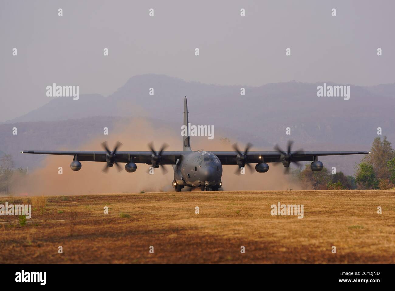 An MC-130J Air Commando II lands on an unimproved runway carrying an ...