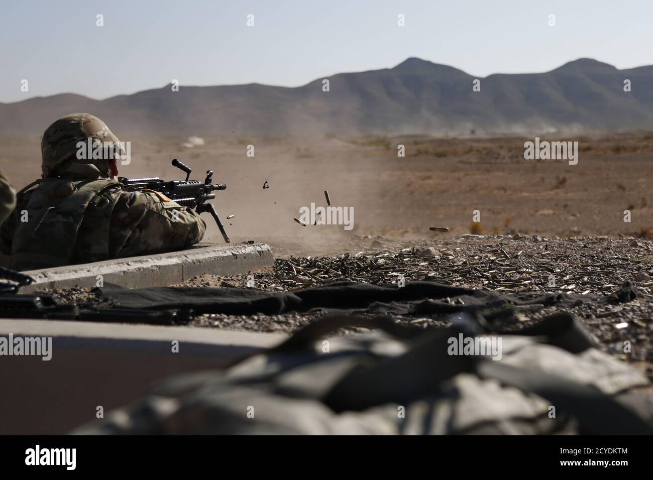 A Soldier from Troop B, 1st Squadron, 113th Cavalry Regiment fires an ...