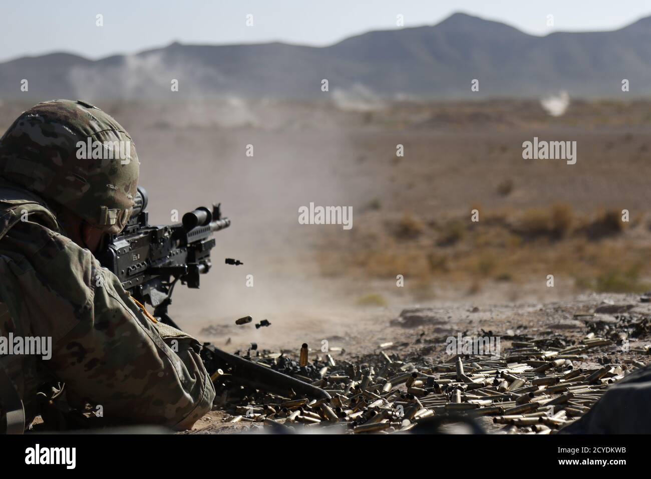 A Soldier from Troop B, 1st Squadron, 113th Cavalry Regiment fires an ...