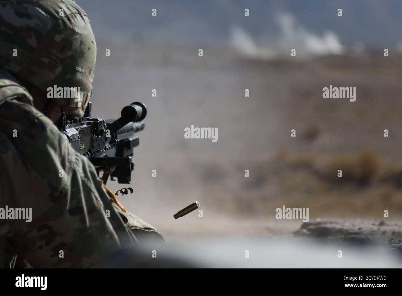 A Soldier from Troop B, 1st Squadron, 113th Cavalry Regiment fires an ...