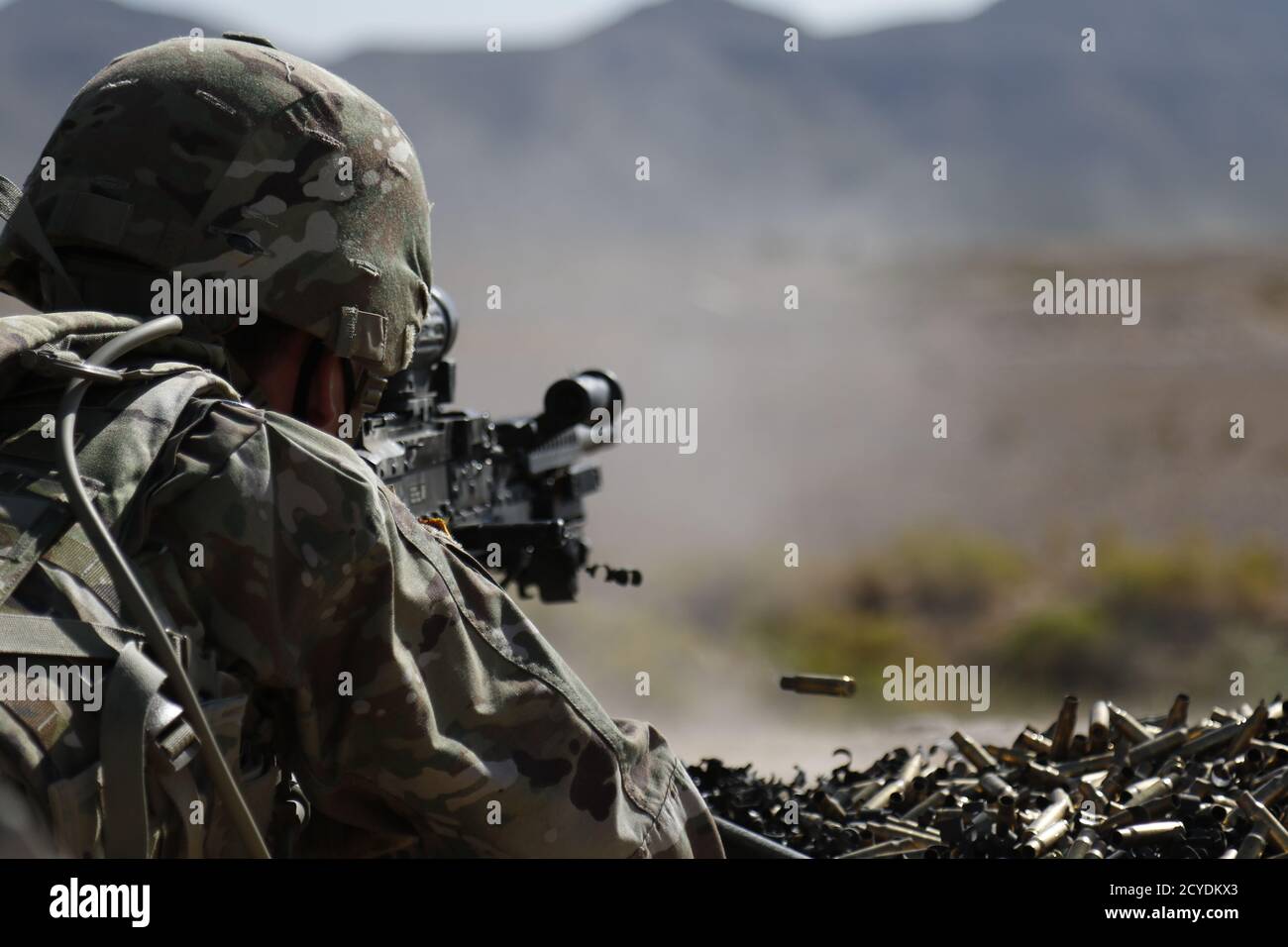 A Soldier from Troop B, 1st Squadron, 113th Cavalry Regiment fires an ...