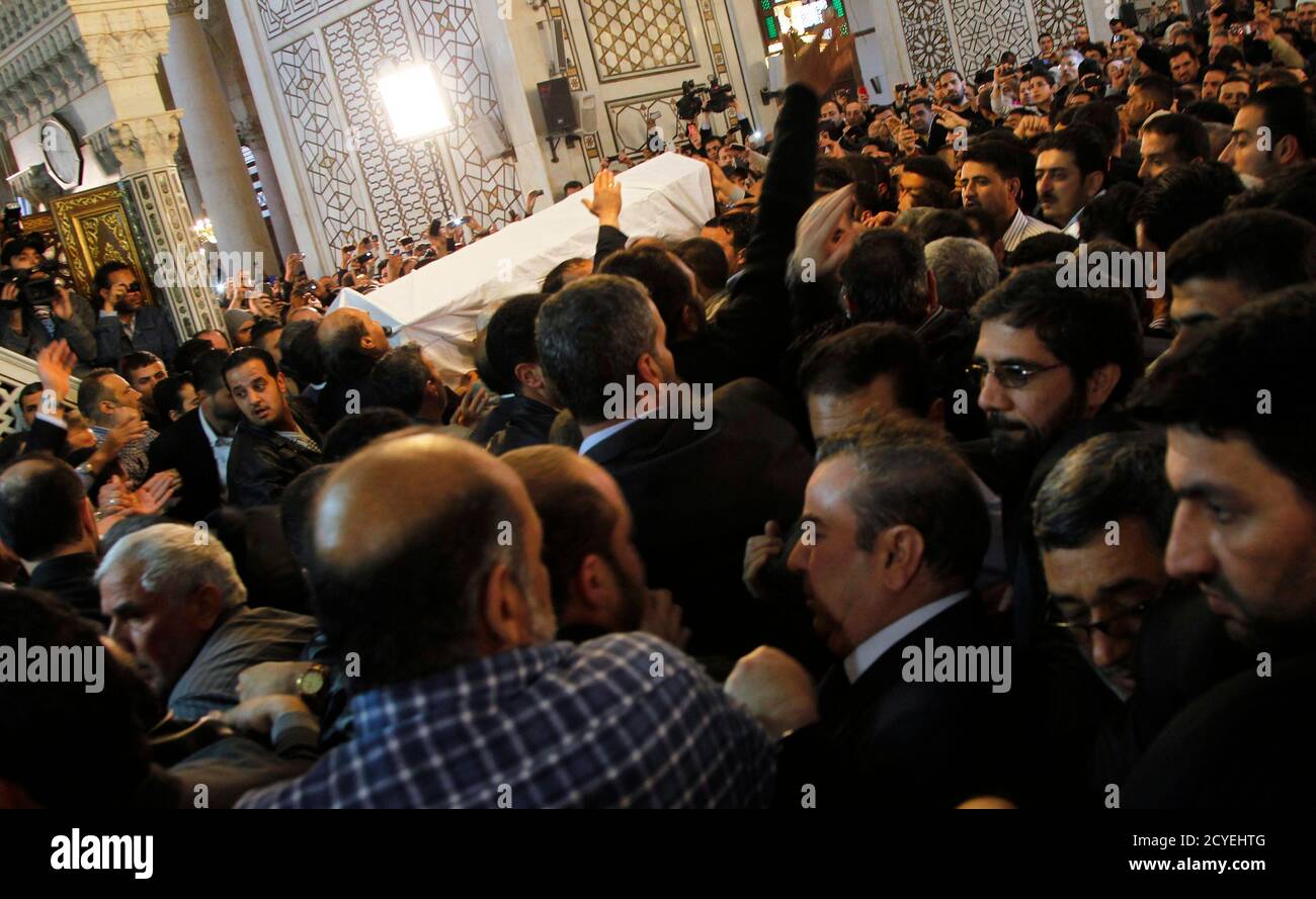 Muslim cleric coffin hi-res stock photography and images - Alamy