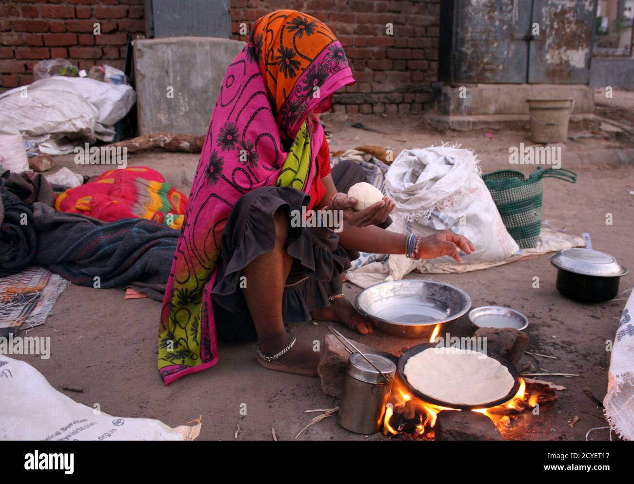 Homeless woman barefoot hi-res stock photography and images - Alamy