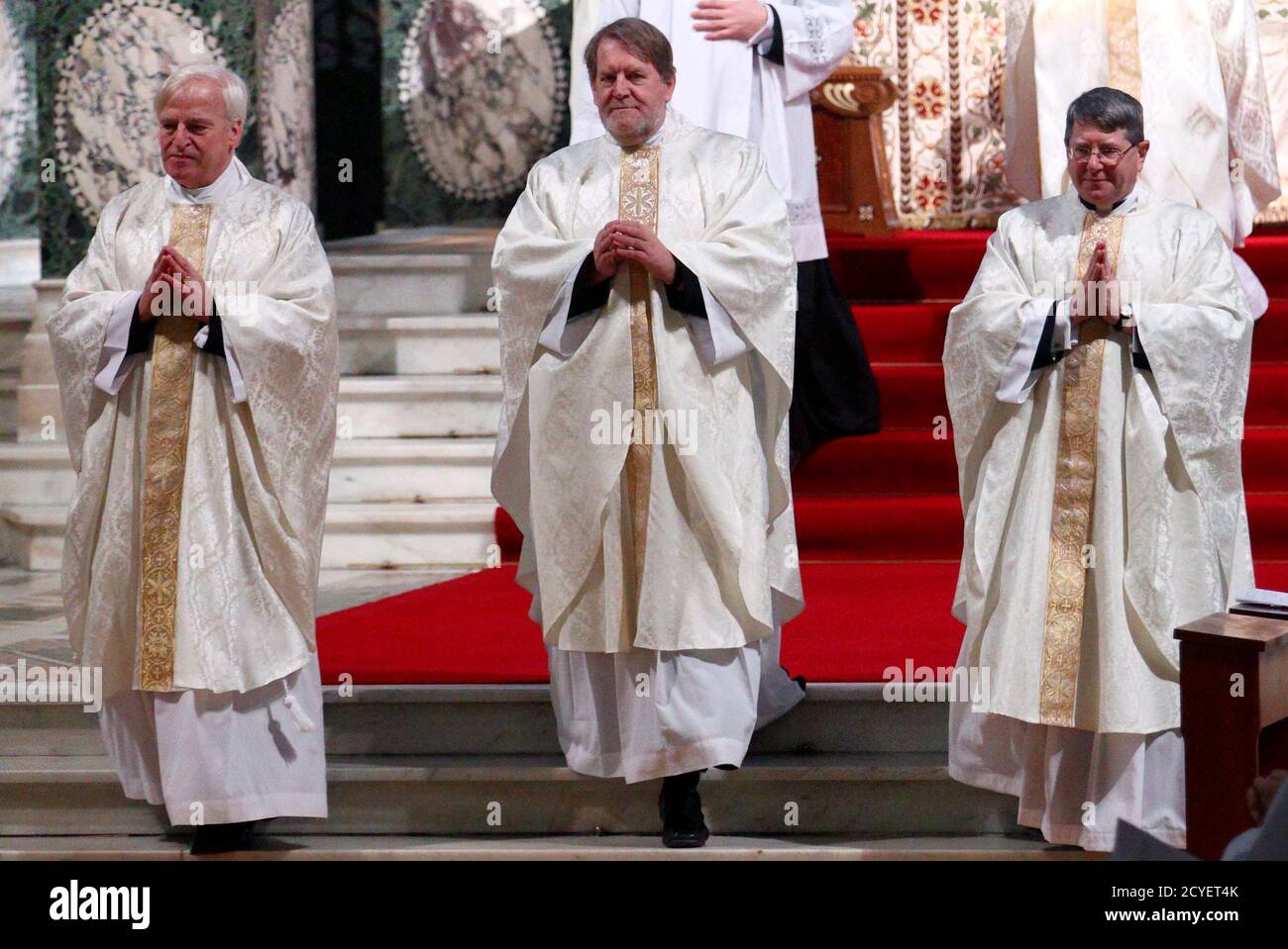 Ordination of three former anglican bishops hi-res stock photography ...