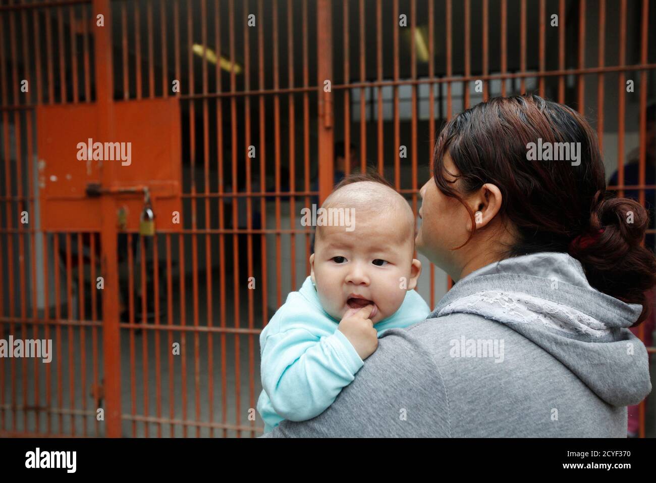 Female prison inmate in cell hi-res stock photography and images - Alamy
