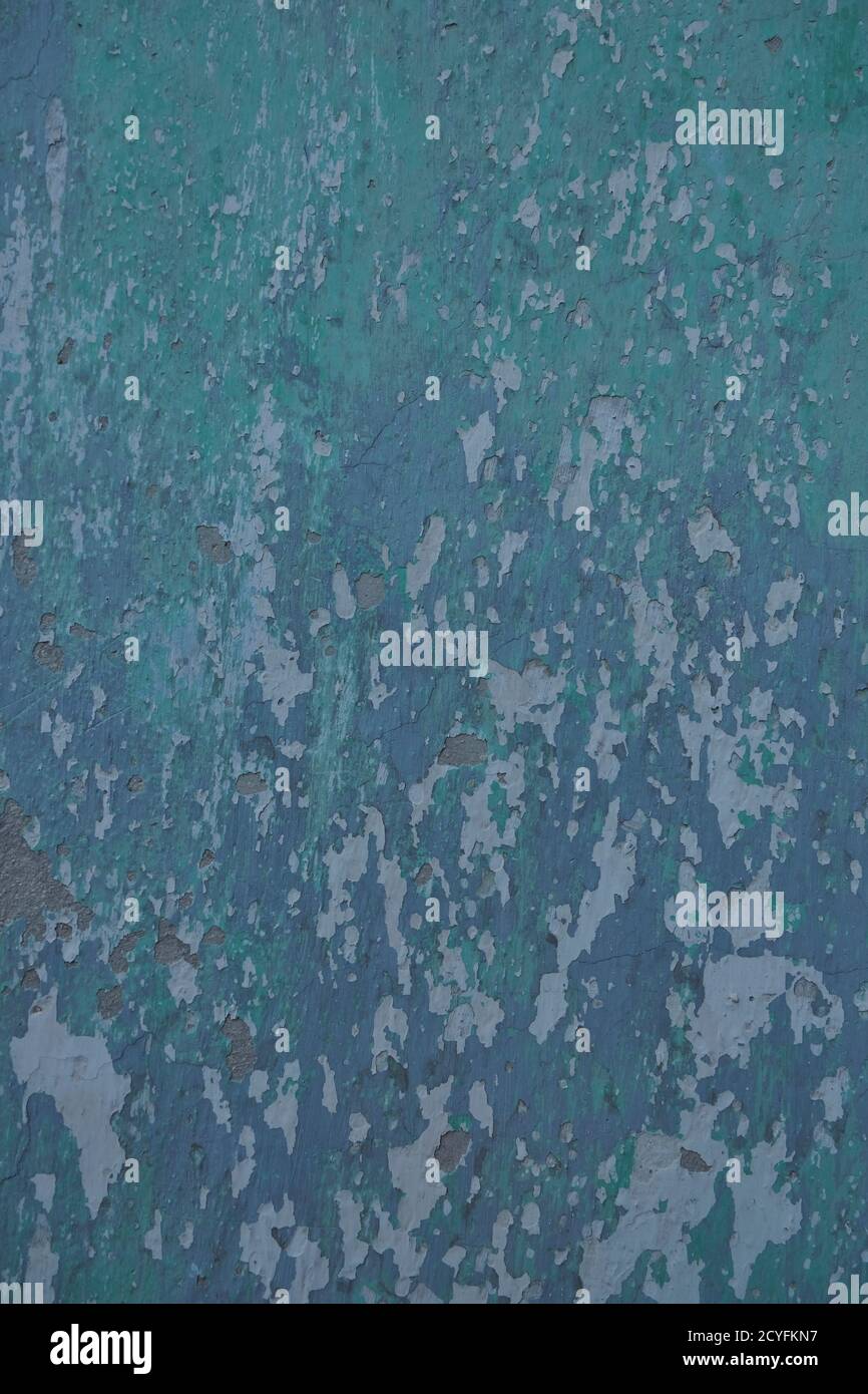 Painted and weathered wall with white, tail and blue Stock Photo - Alamy