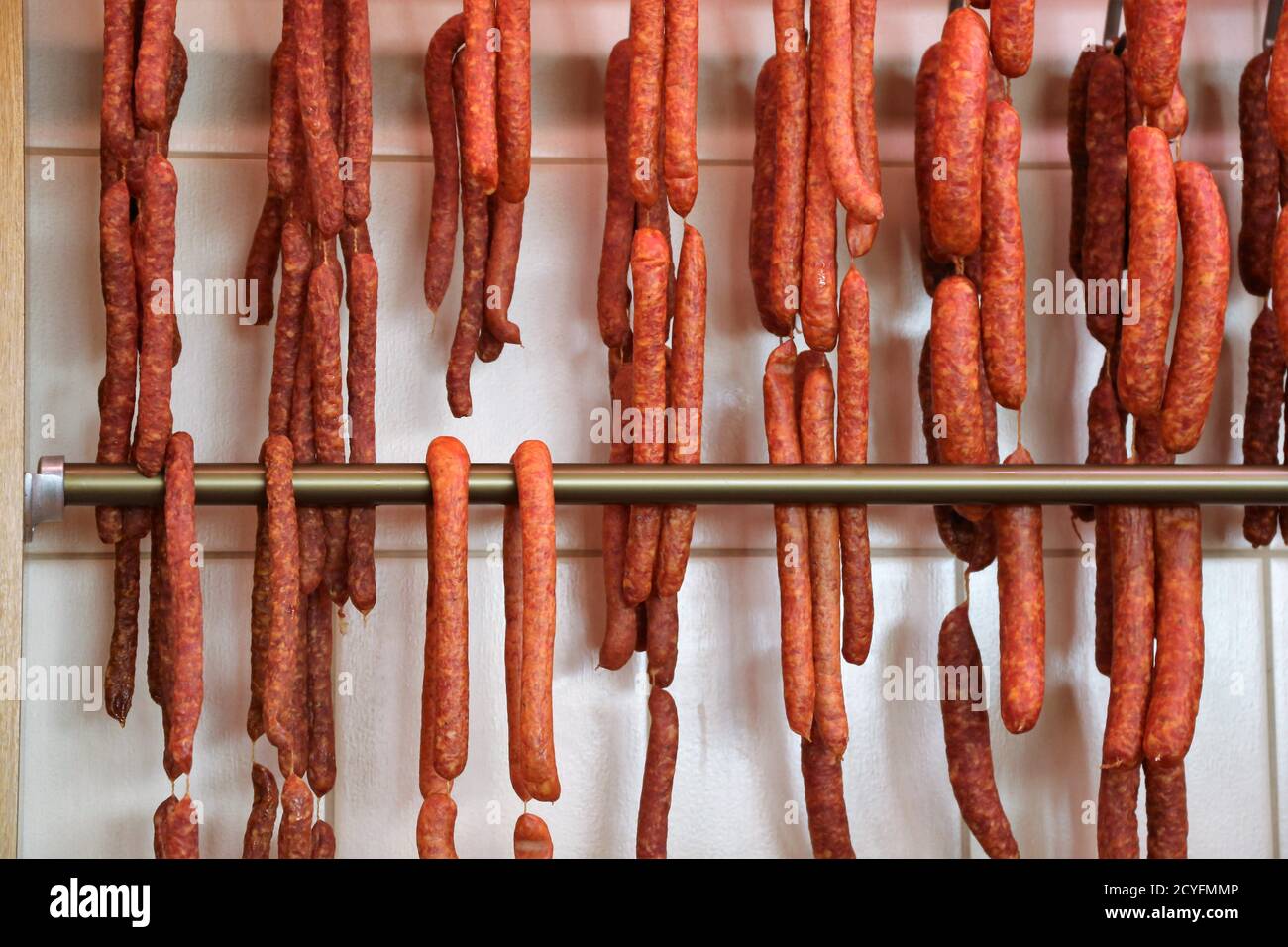 Air dried sausage in a butchery Stock Photo - Alamy