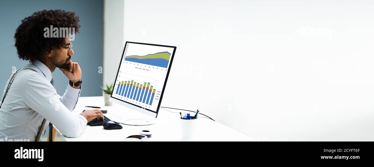 Business Data Analyst Using Computer. African American Advisor Stock ...