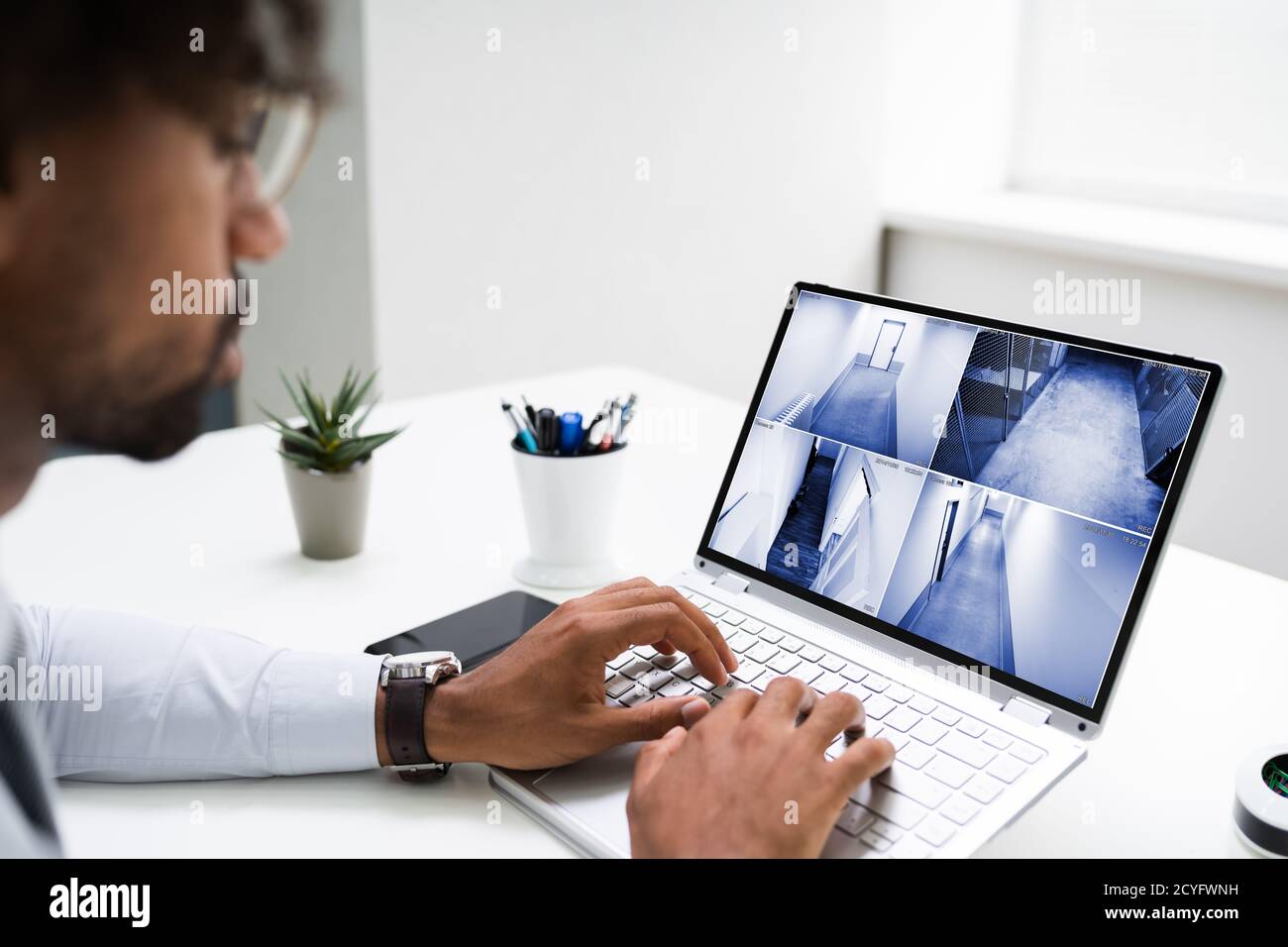 CCTV Security Footage On Notebook Computer Monitor Stock Photo - Alamy