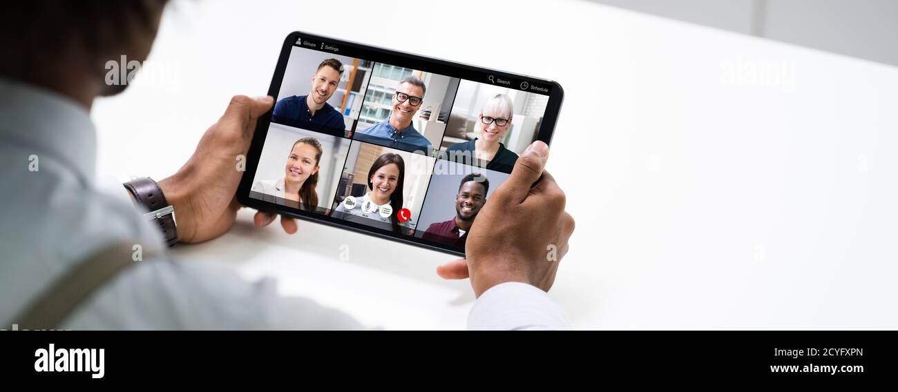 Video Conference Business Call. African Man Conferencing On Tablet ...