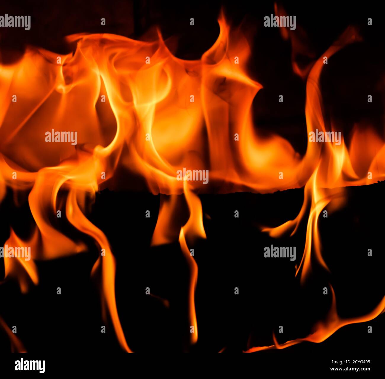 Red blaze Fire flame on a black background Stock Photo - Alamy