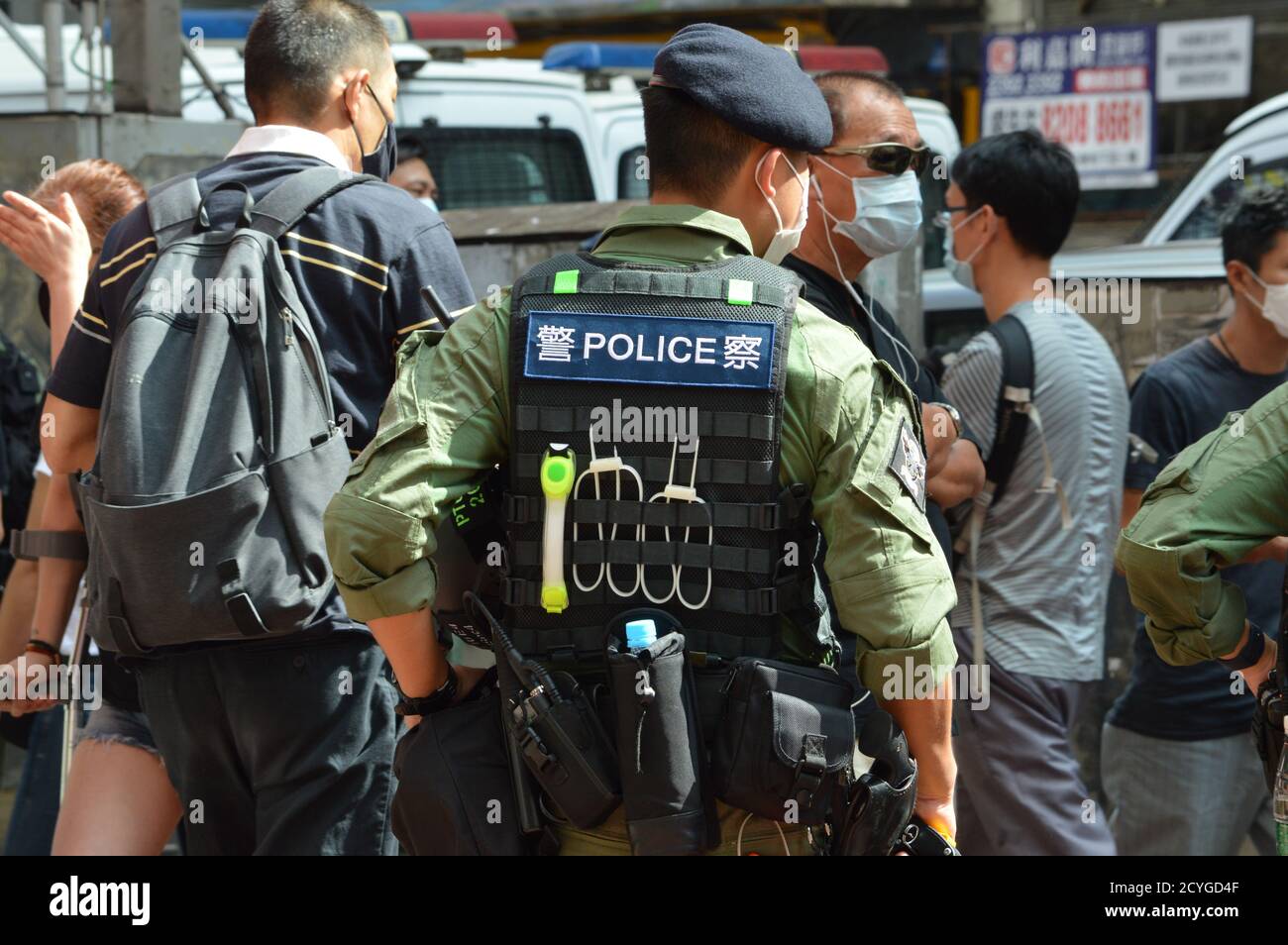 Hong Kong Police Force officer in Causeway Bay shopping district on ...
