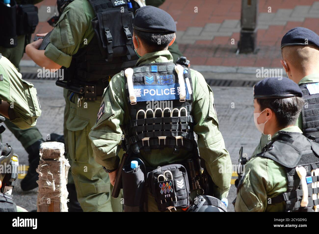 Hong Kong Police Force officer in Causeway Bay shopping district on ...