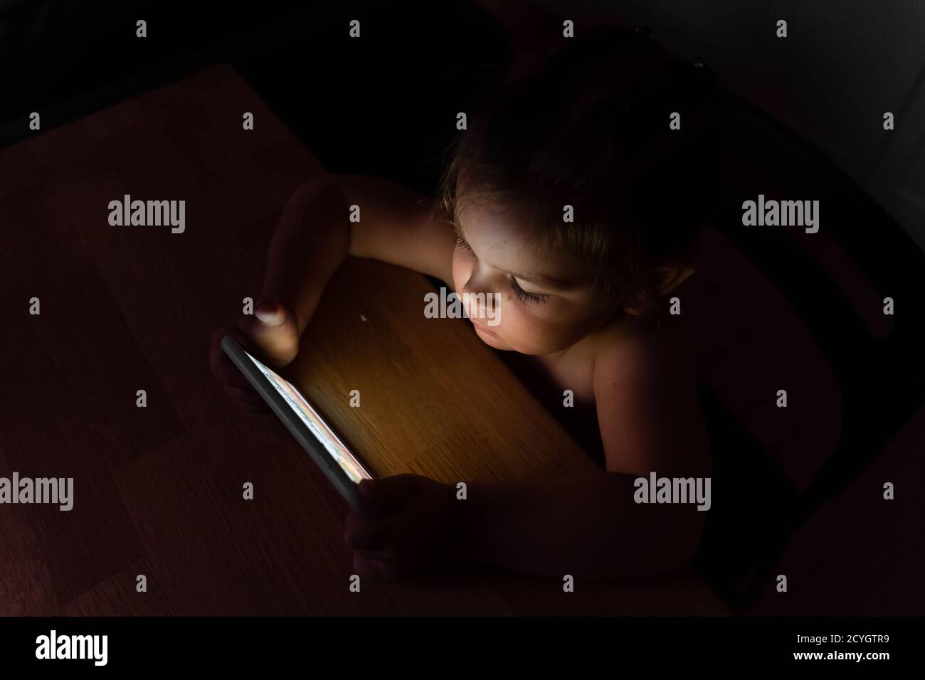 Child device night hi-res stock photography and images - Alamy