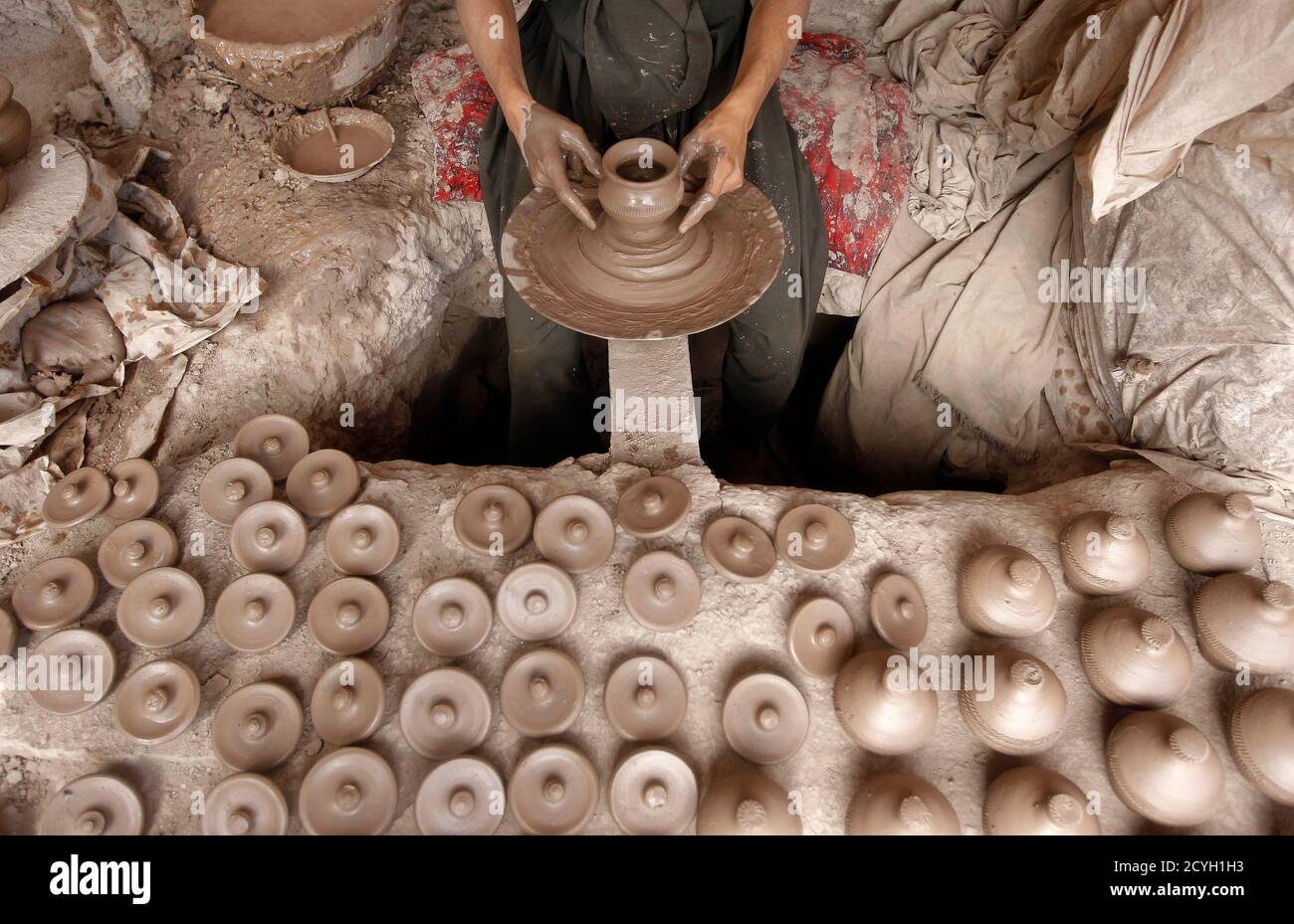 Factory worker afghan hi-res stock photography and images - Alamy