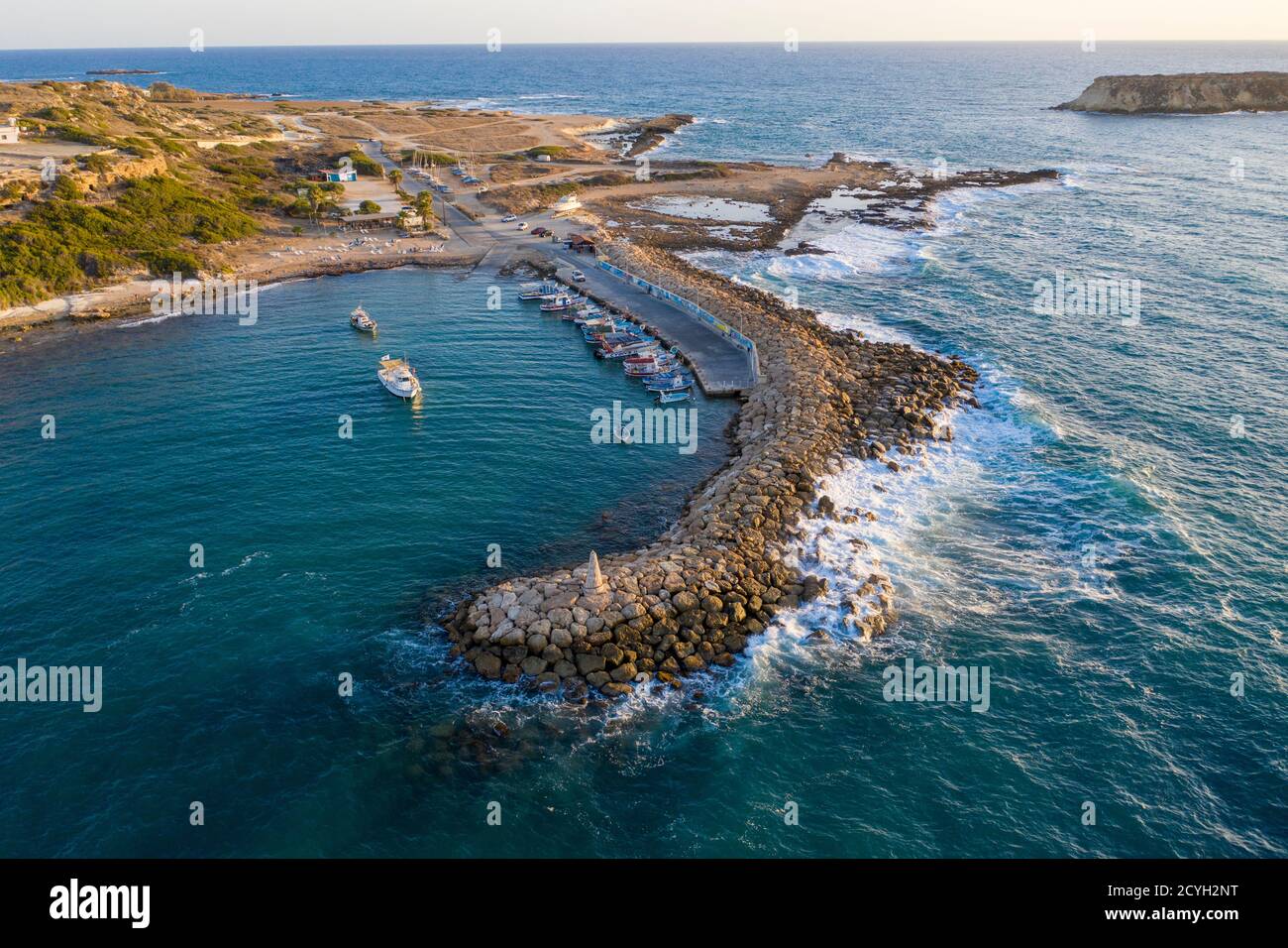 Aerial view of Agios Georgios (St Georges) harbour and church, Akamas ...