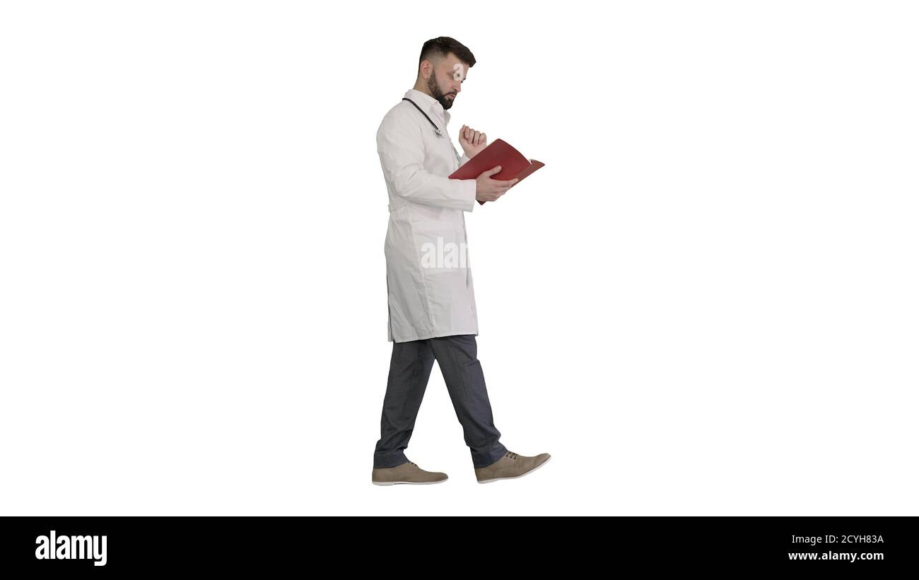Doctor reading book journal hi-res stock photography and images - Alamy
