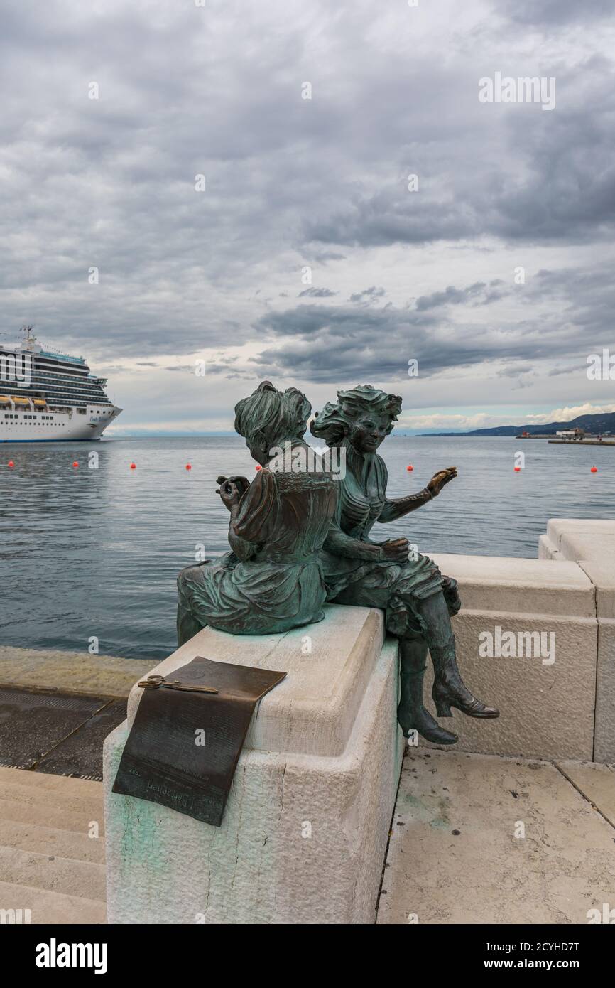 Le Sartine statue at Trieste waterfront, Costa Deliziosa cruise ship in ...