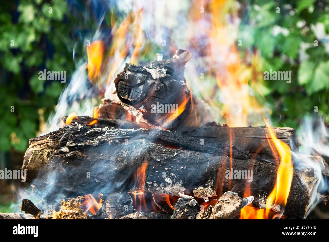 firewood burning on the brazier brazier, fire, coals, background Stock ...