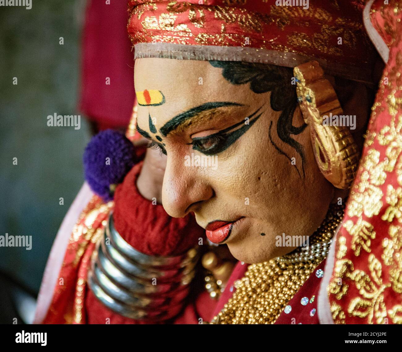 Munnar, India, Mar 11, 2018 - Traditional Indian dancer adjusts his ...