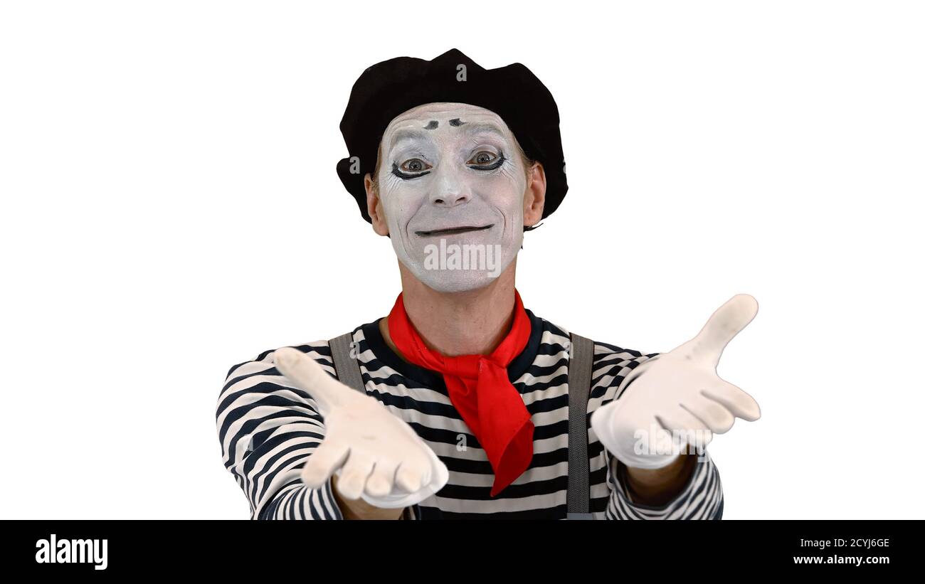 Mime sending you his heart on white background Stock Photo - Alamy