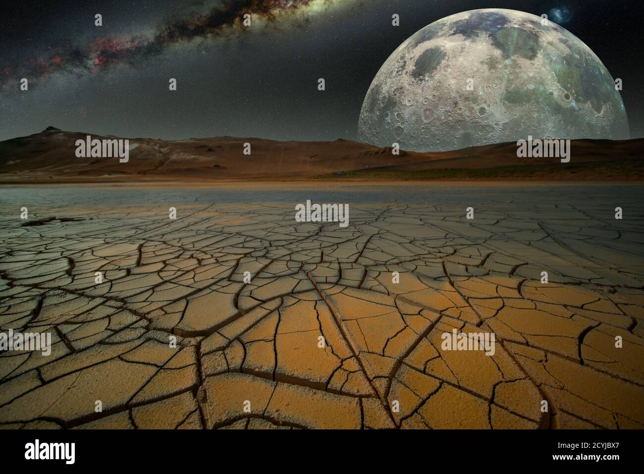 Fantastic night landscape with cracked earth mountains and moon ...