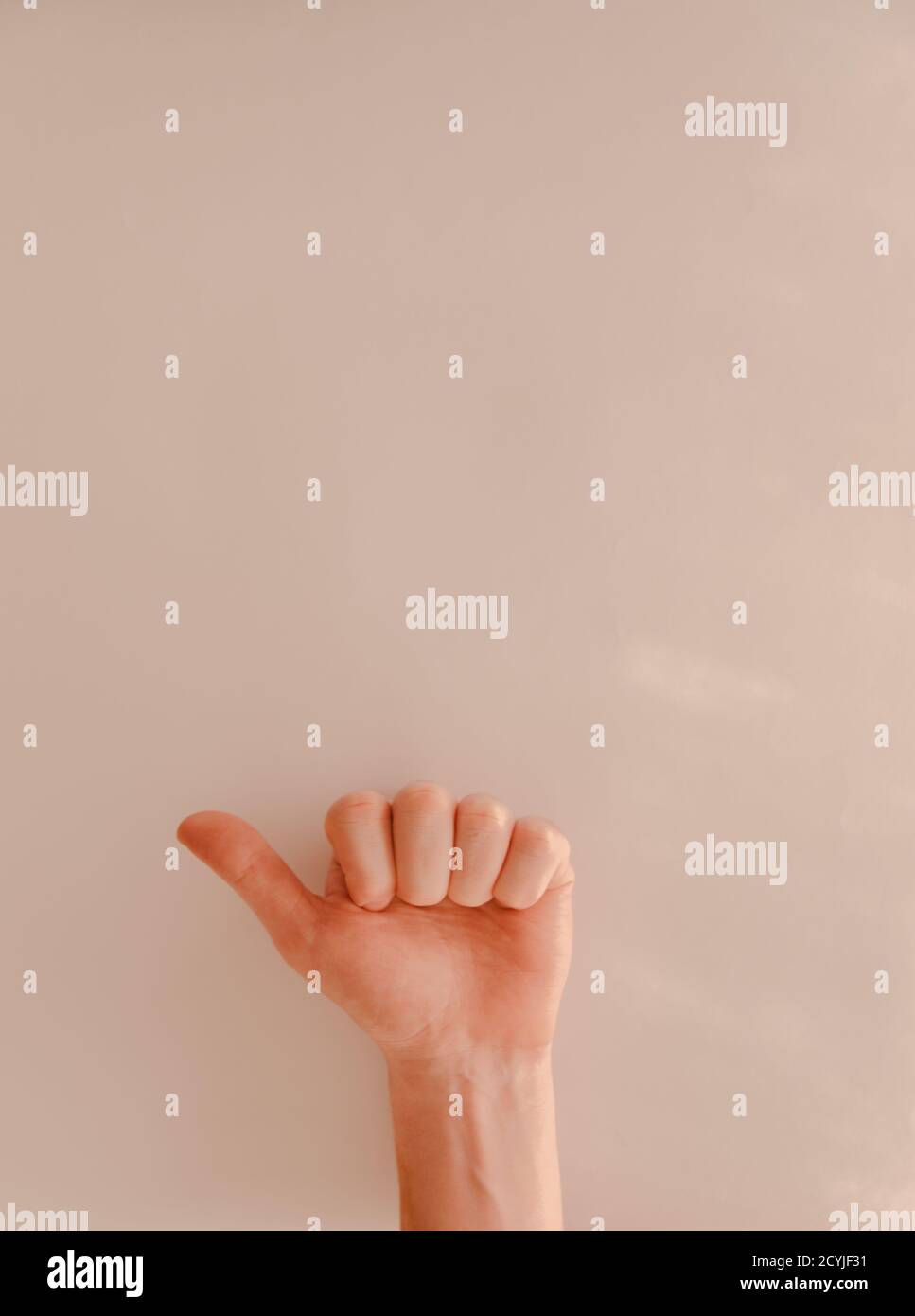 Vertical shot of a hand showing "left Stock Photo - Alamy