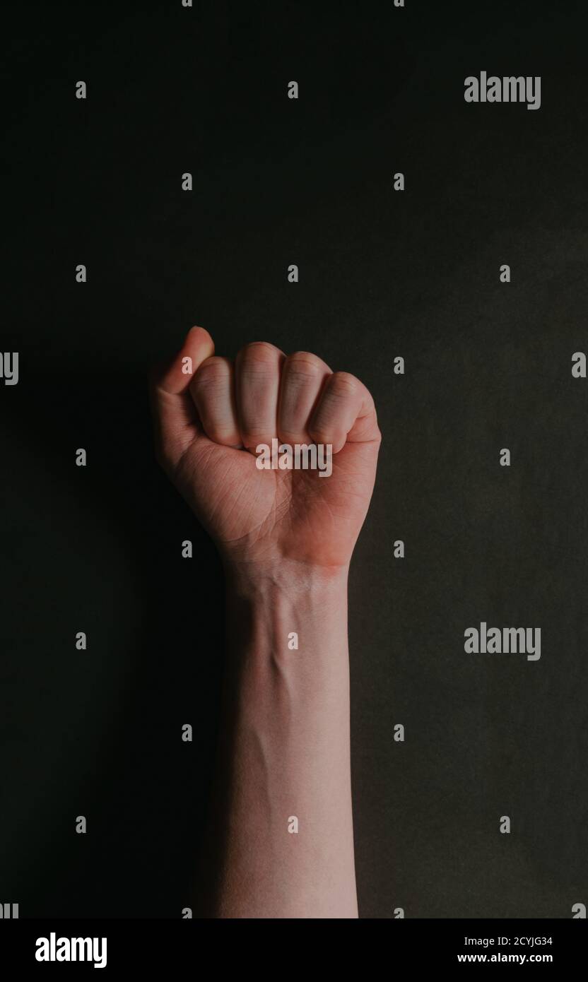 Vertical shot of clenched fist - concept of solidarity and support ...