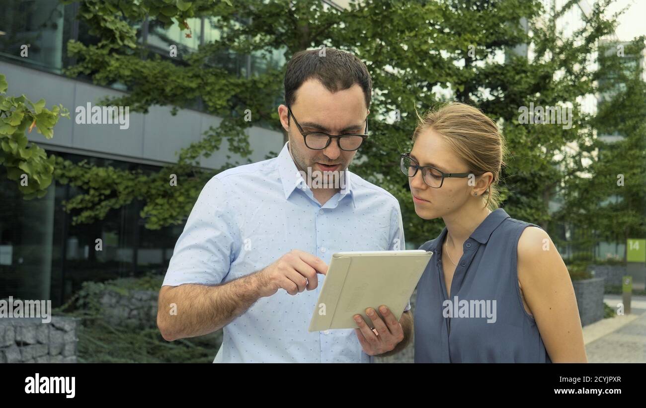 Smiling young man outside office hi-res stock photography and images ...