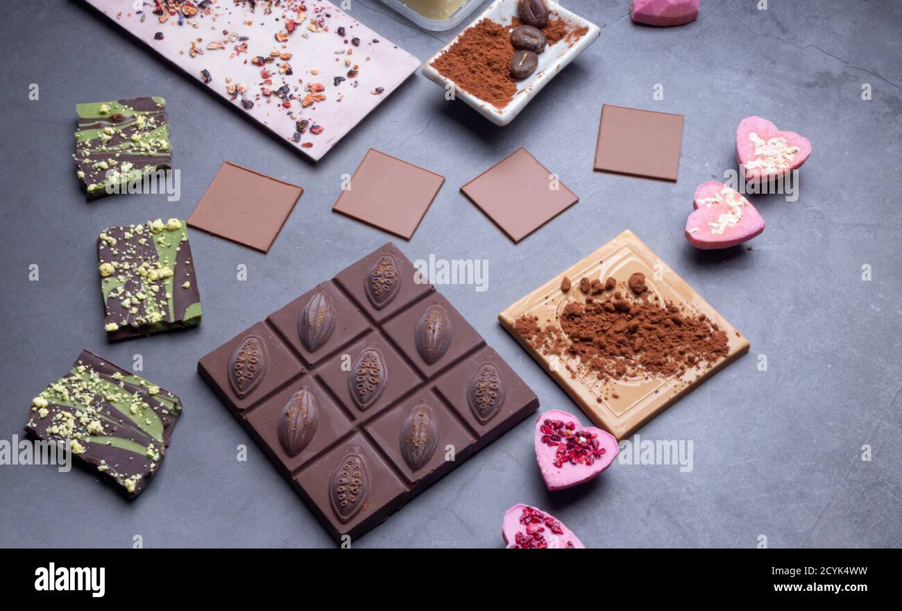 assorted colorful chocolate bar. Sweets dessert of various black milk ...
