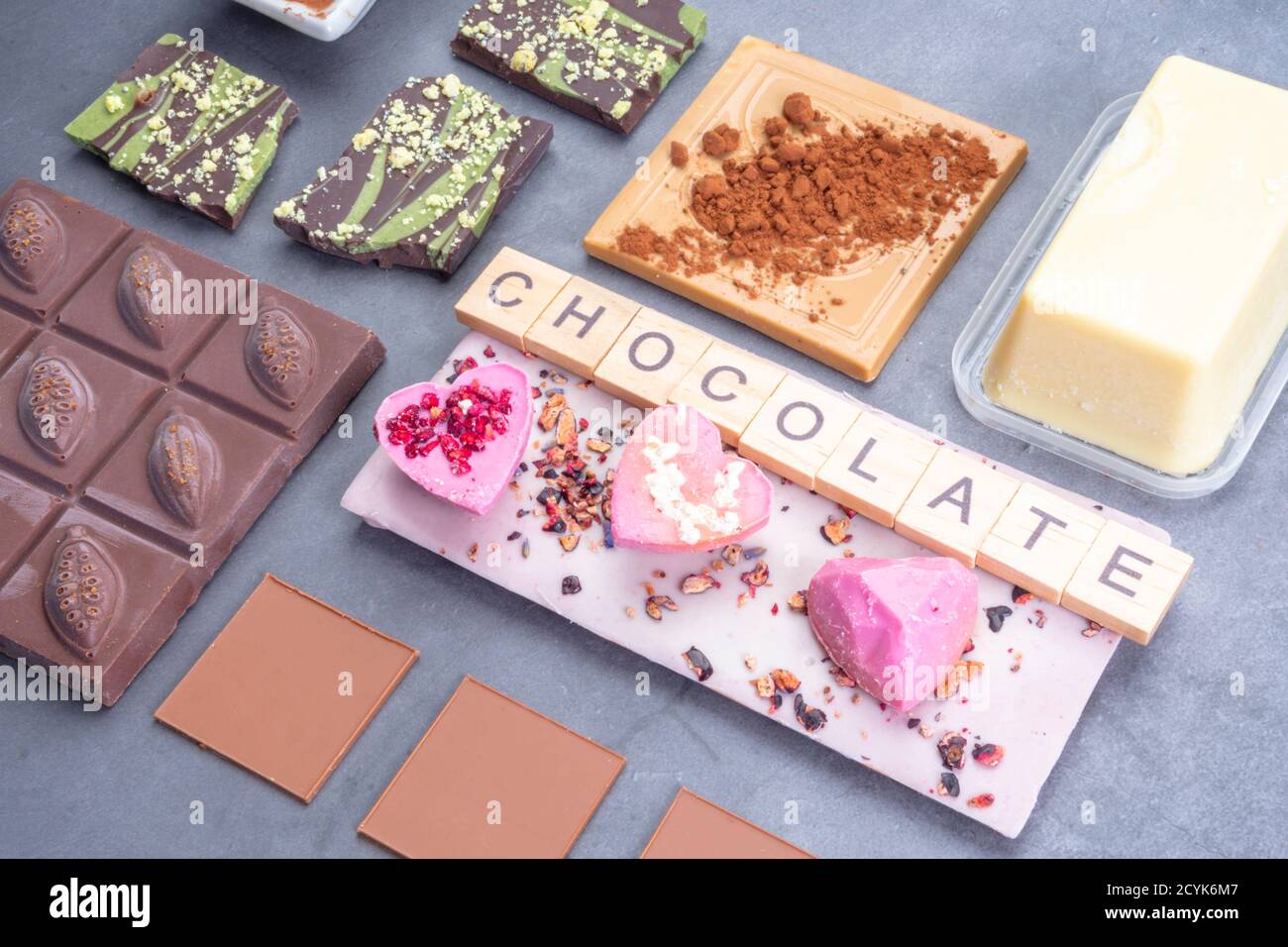 assorted colorful chocolate bar. Sweets dessert of various black milk ...