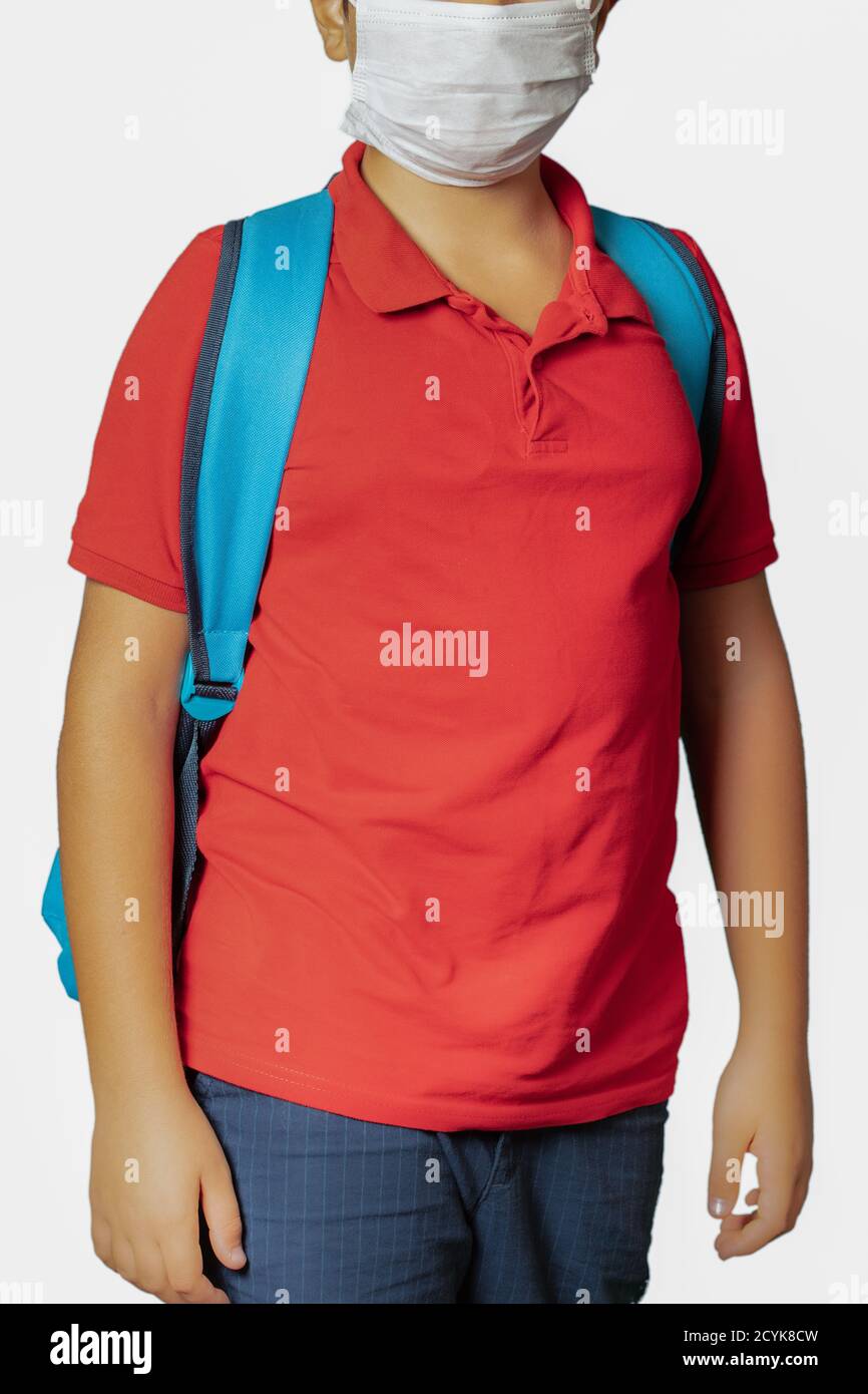 kid boy wearing backpack standing over isolated white background Stock ...